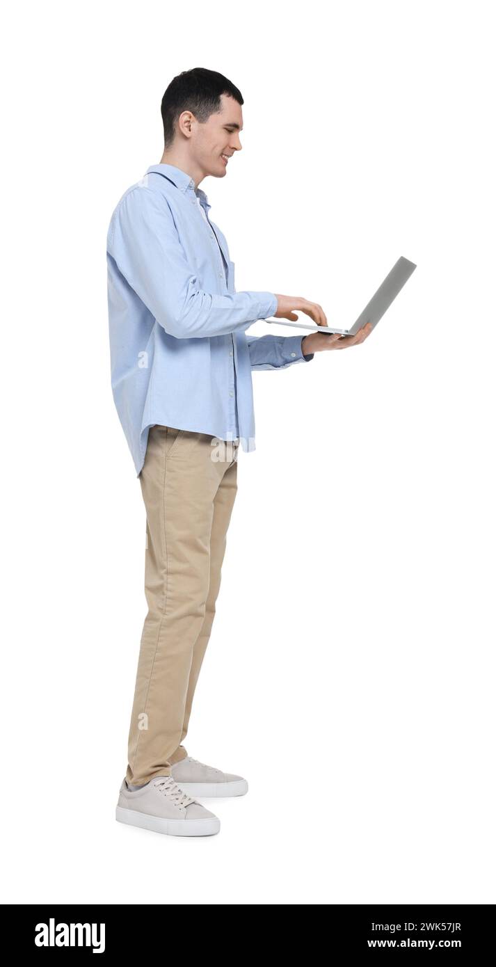 Happy young guy using Cut Out Stock Images & Pictures - Alamy