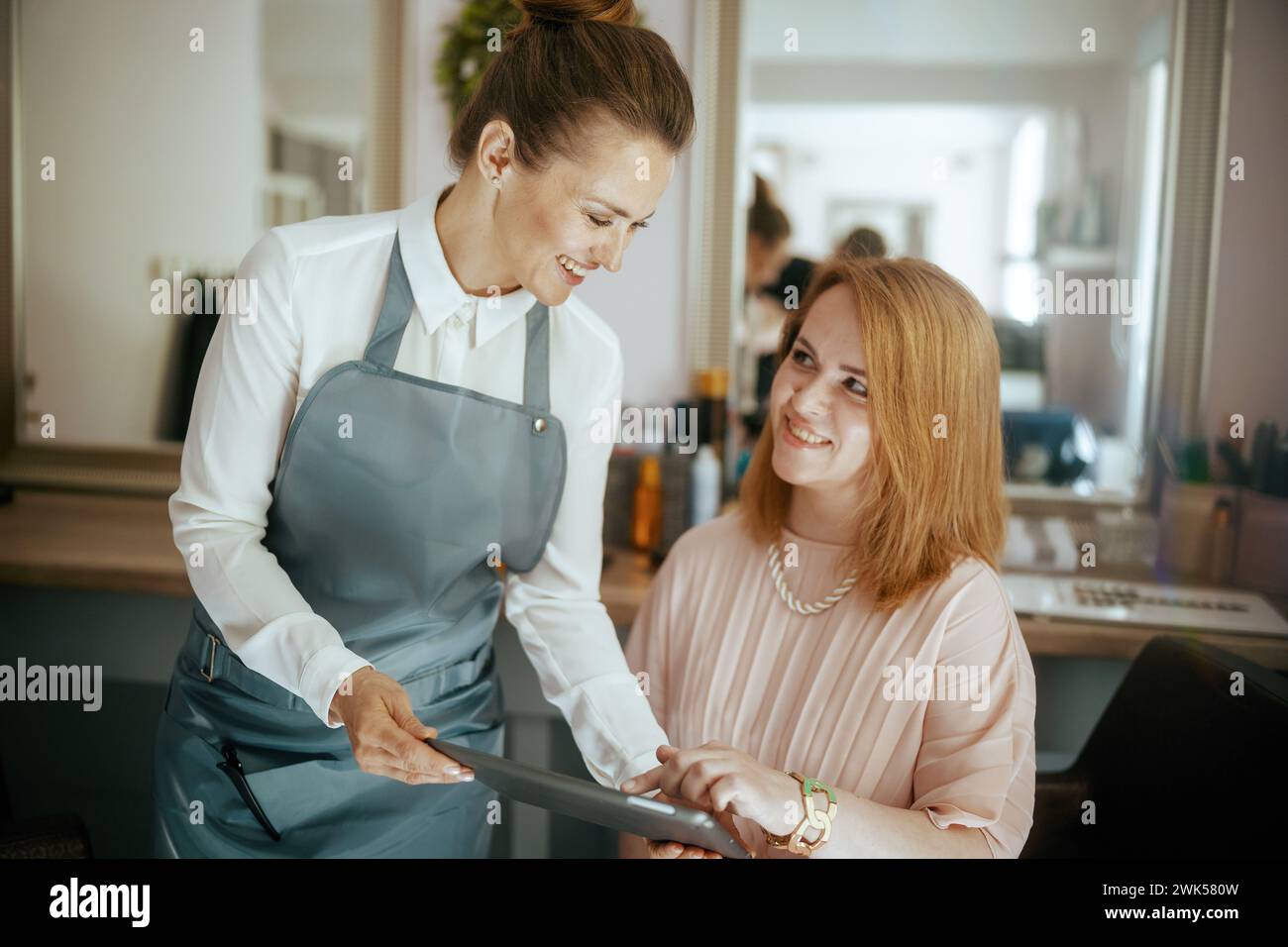 Hair salon worker hi-res stock photography and images - Alamy