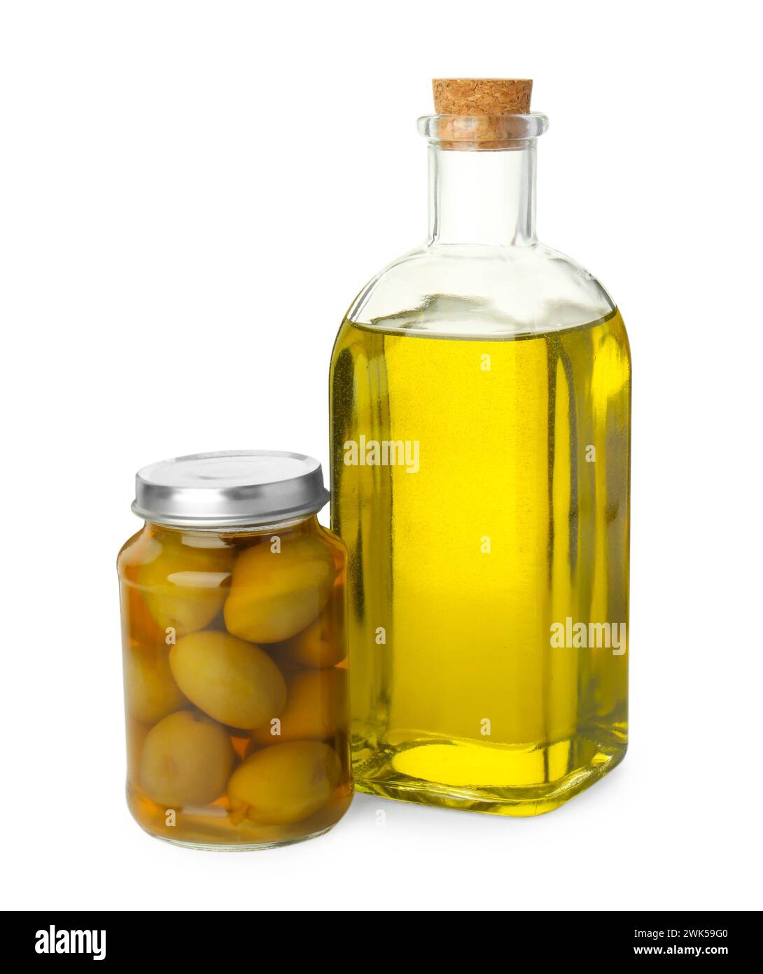 Vegetable fats. Bottle of cooking oil and olives isolated on white ...