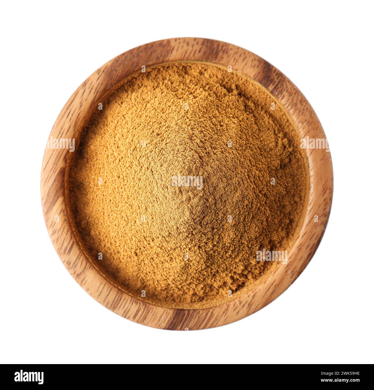 Dry aromatic cinnamon powder in wooden bowl isolated on white, top view ...