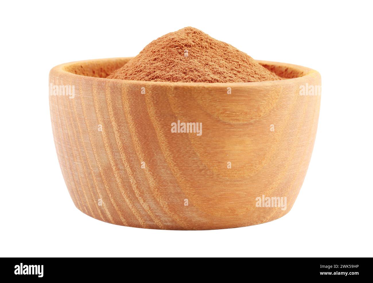 Dry aromatic cinnamon powder in wooden bowl isolated on white Stock ...