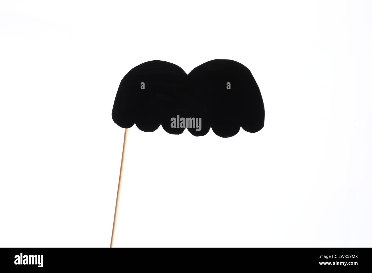 Fake paper mustache party prop against white background Stock Photo - Alamy