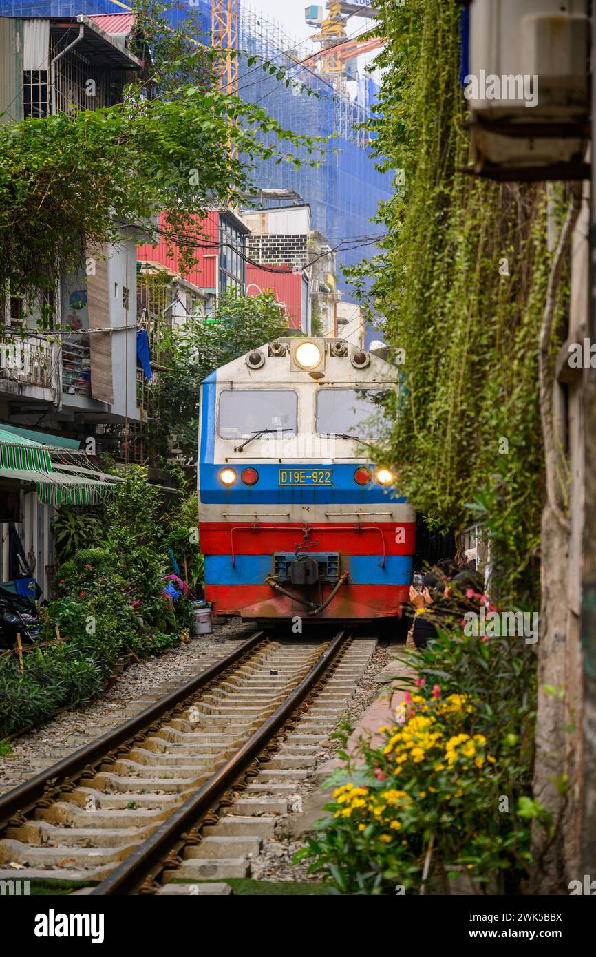 An approaching Vietnamese railway train on Train Street, Hanoi, Vietnam ...