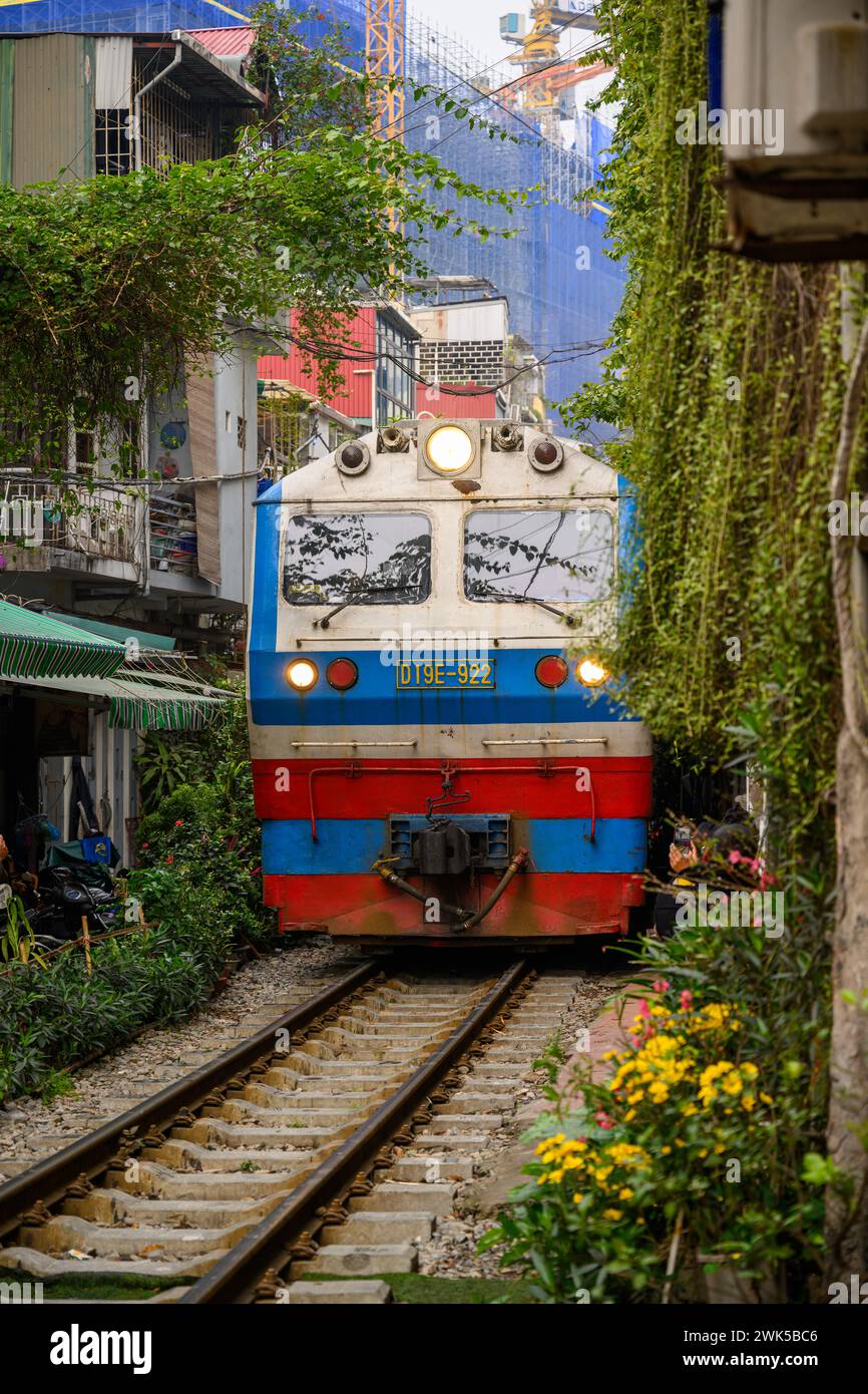 An approaching Vietnamese railway train on Train Street, Hanoi, Vietnam ...