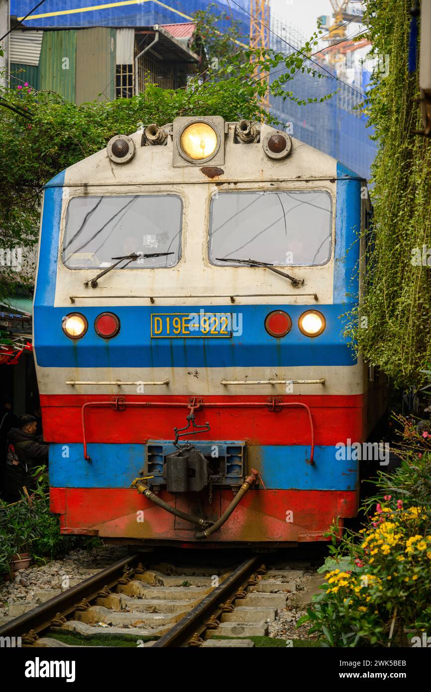 An approaching Vietnamese railway train on Train Street, Hanoi, Vietnam ...