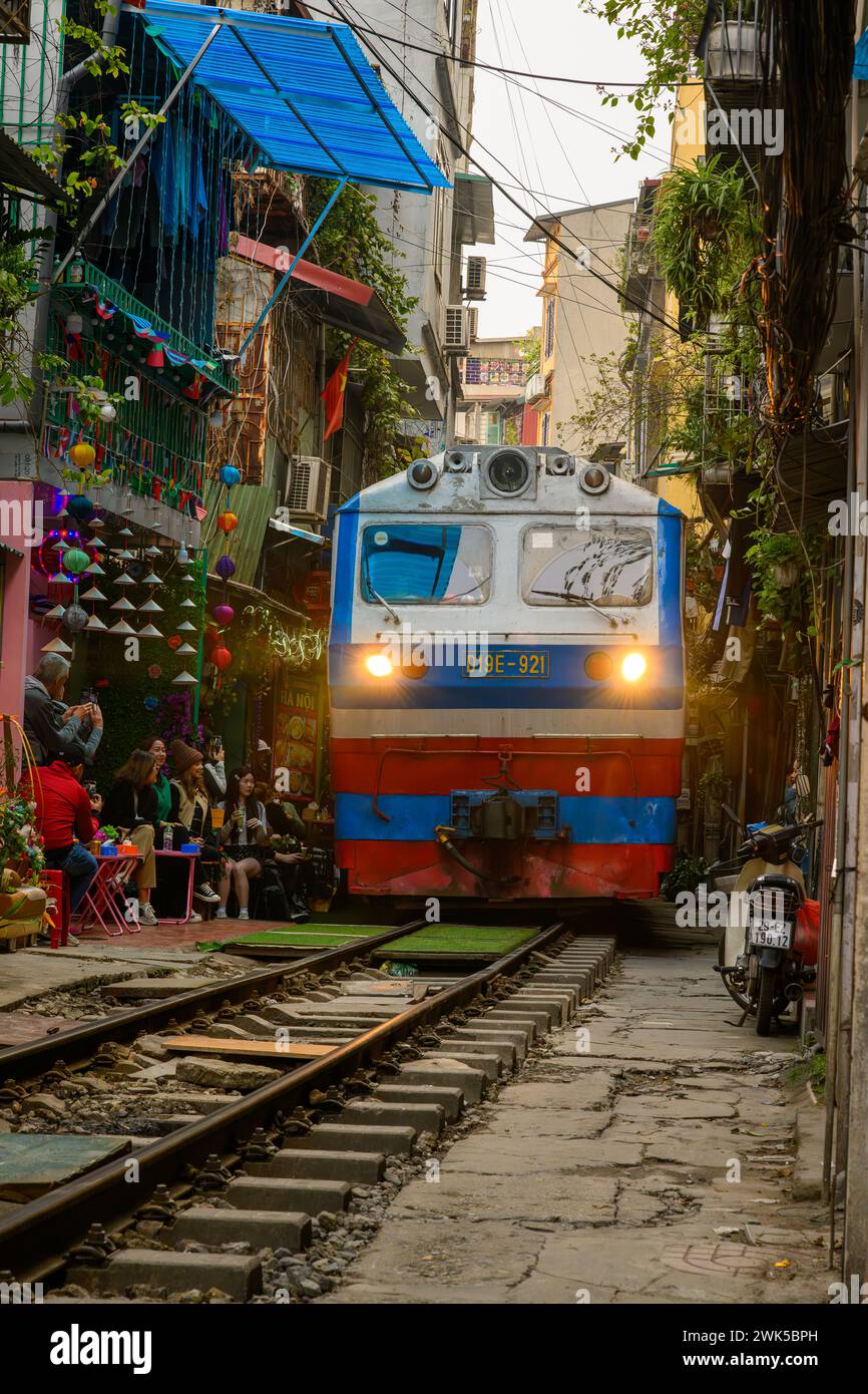 An approaching Vietnamese railway train on Train Street, Hanoi, Vietnam ...