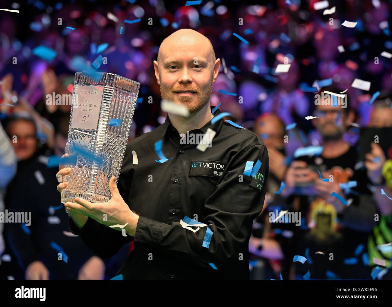 Gary Wilson lifts the Ray Reardon Trophy as he celebrates his victory ...
