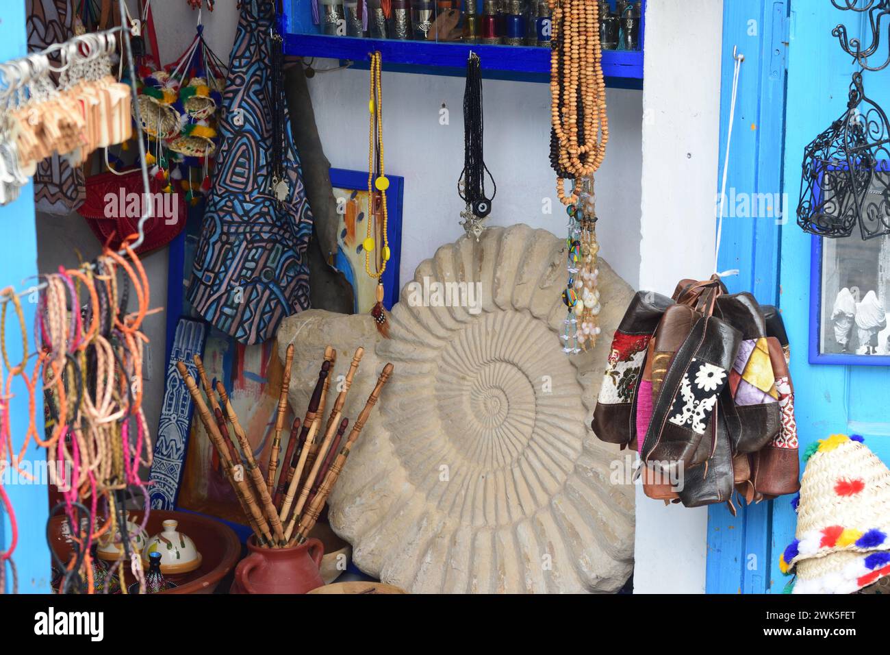 traditional items exposed to sale in markets including a giant ammonite ...