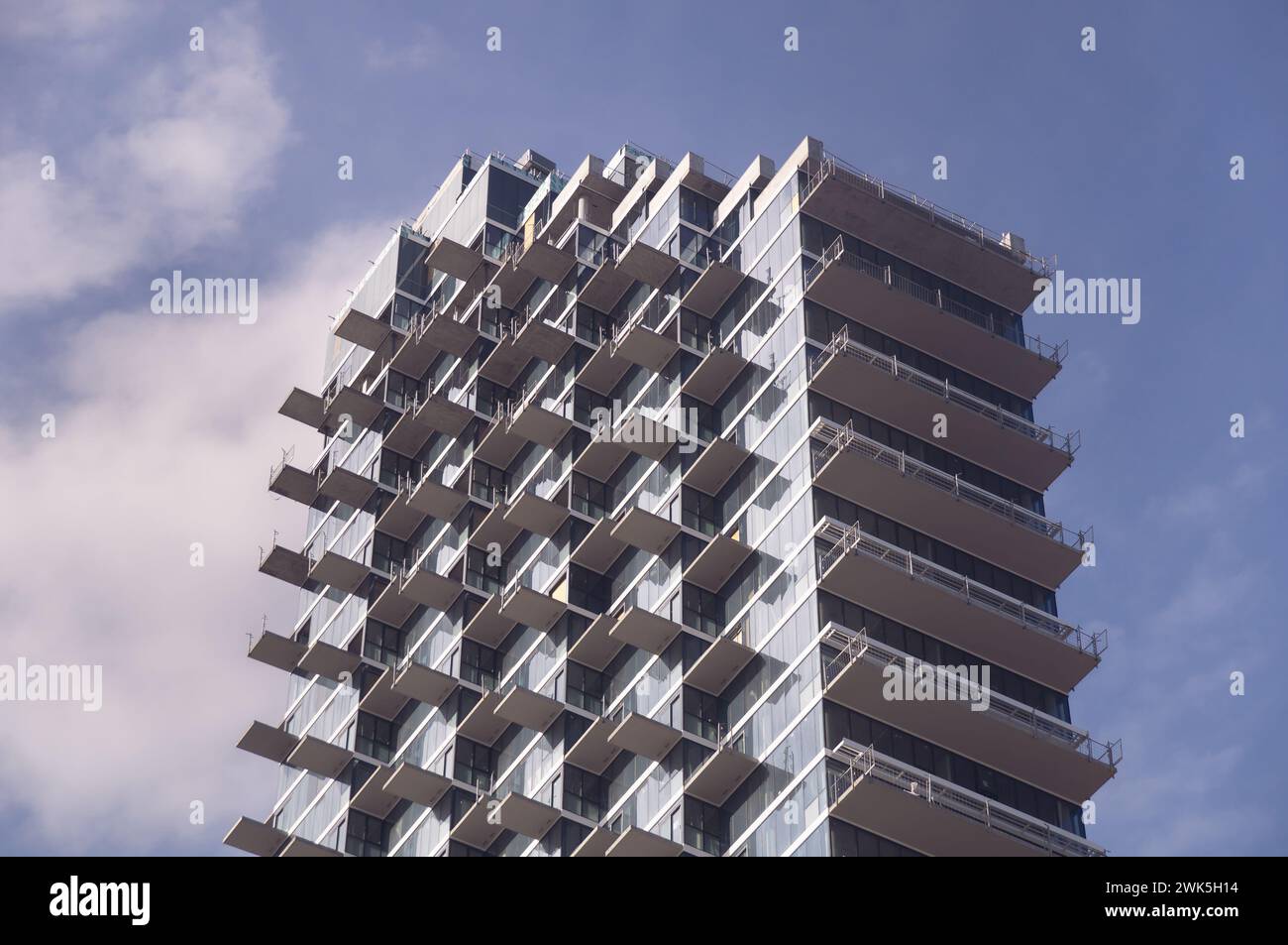 Urban geometry. Top of a high-rise residential building with glassy ...