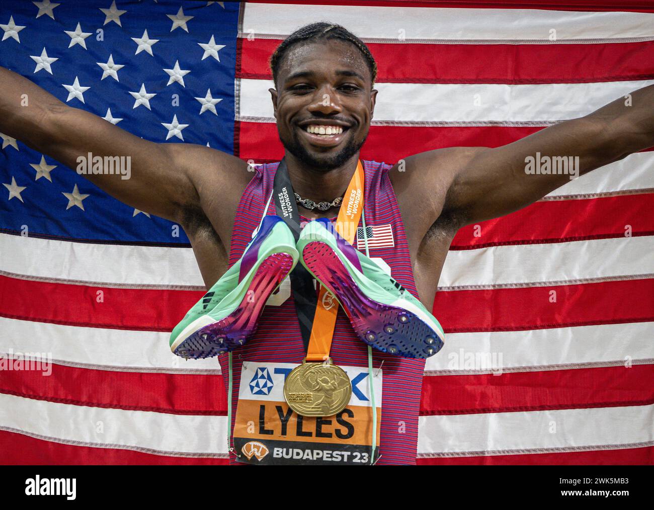 Noah LYLES celebrating his medal with the flag in the Budapest 2023 World Athletics ...