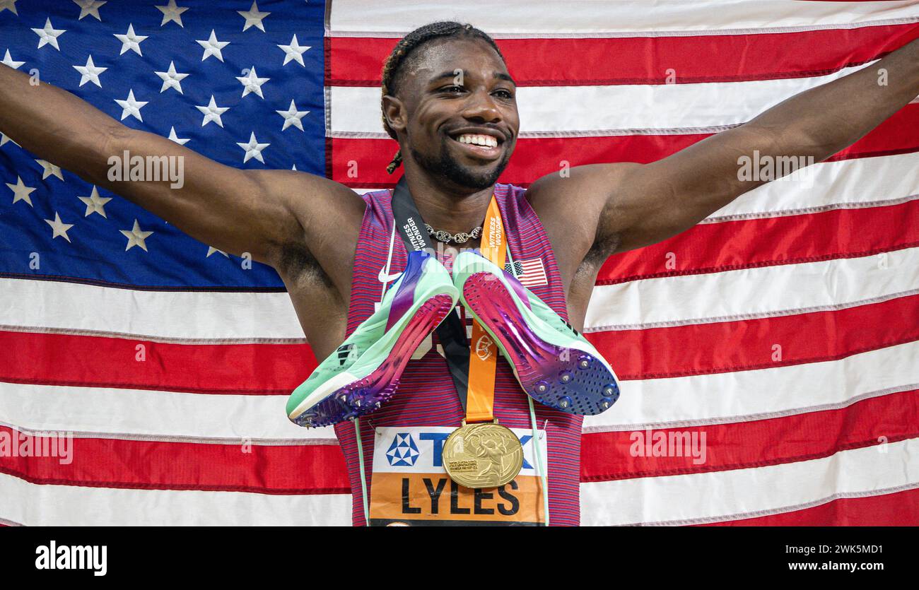 Noah LYLES celebrating his medal with the flag in the Budapest 2023 ...