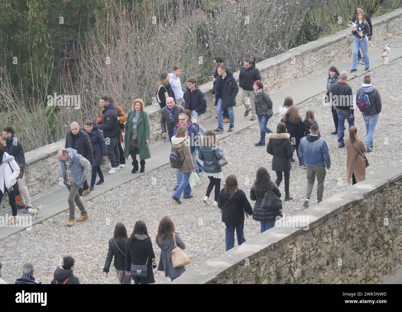 Bergamo, Italy. 19th Feb, 2024. Sunday afternoon many people walking in ...
