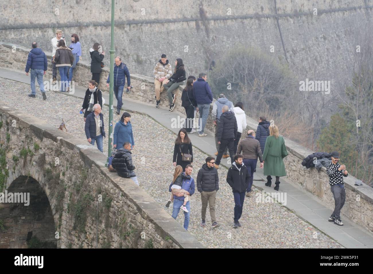Bergamo, Italy. 19th Feb, 2024. Sunday afternoon many people walking in ...