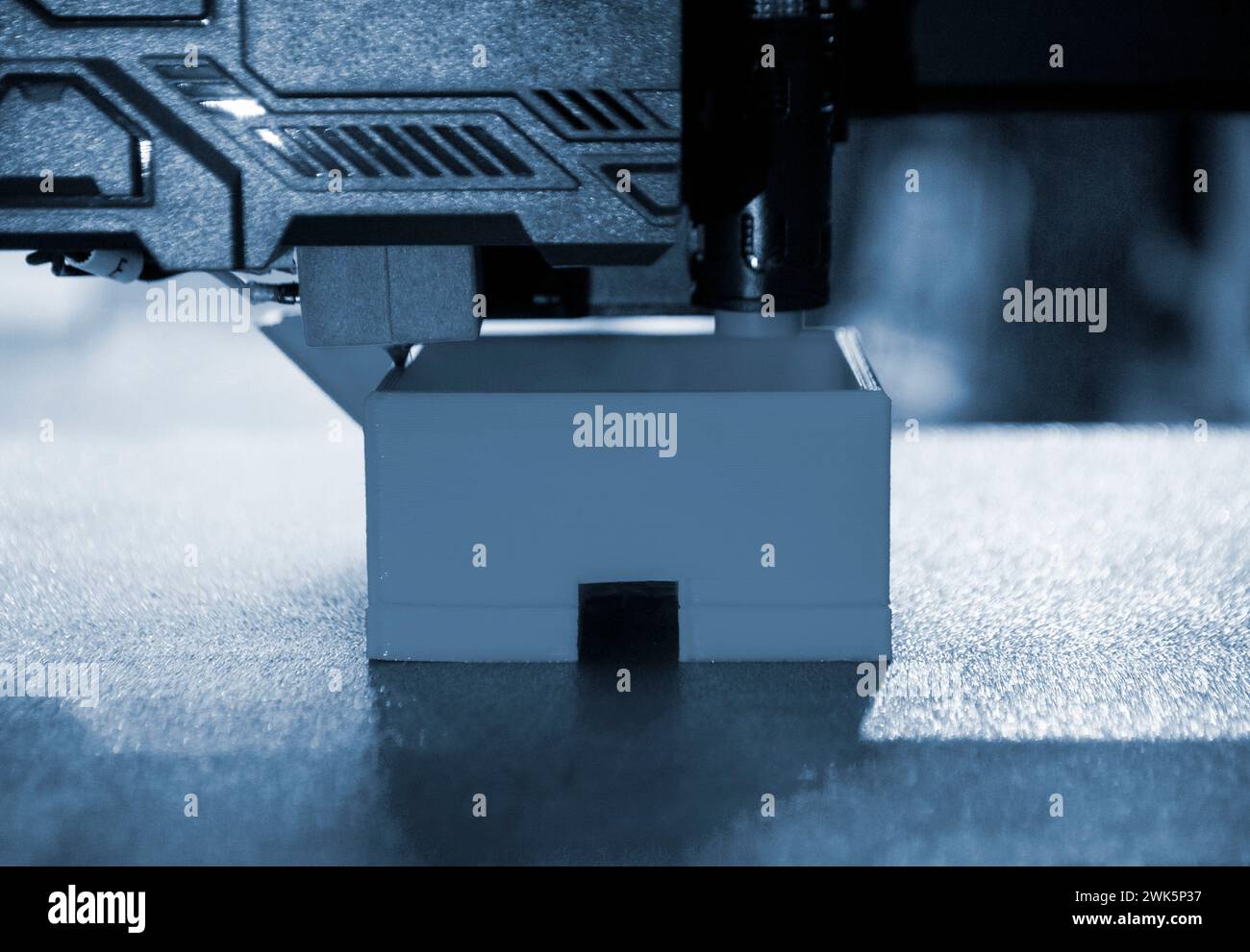 The process of printing an object with 3D printer. 3D printer printing ...