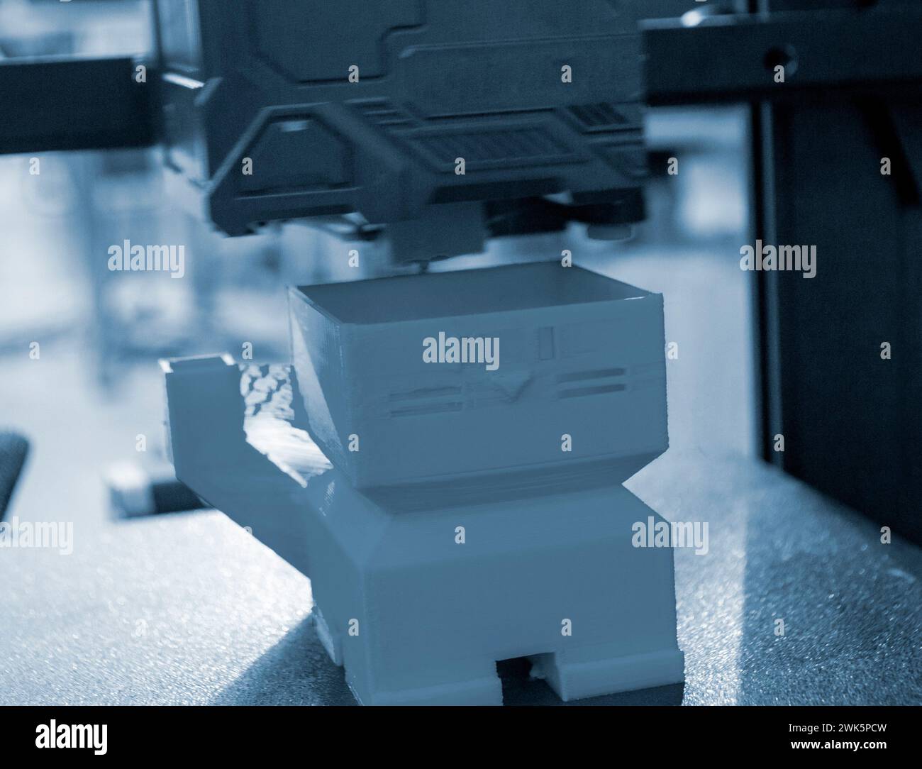 The process of printing an object with 3D printer. 3D printer printing ...