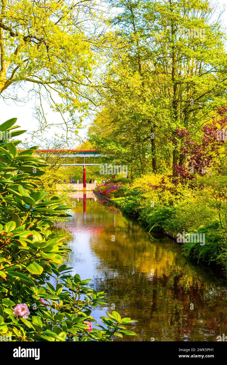 Lake River with beautiful well Fountain in the park with people and ...