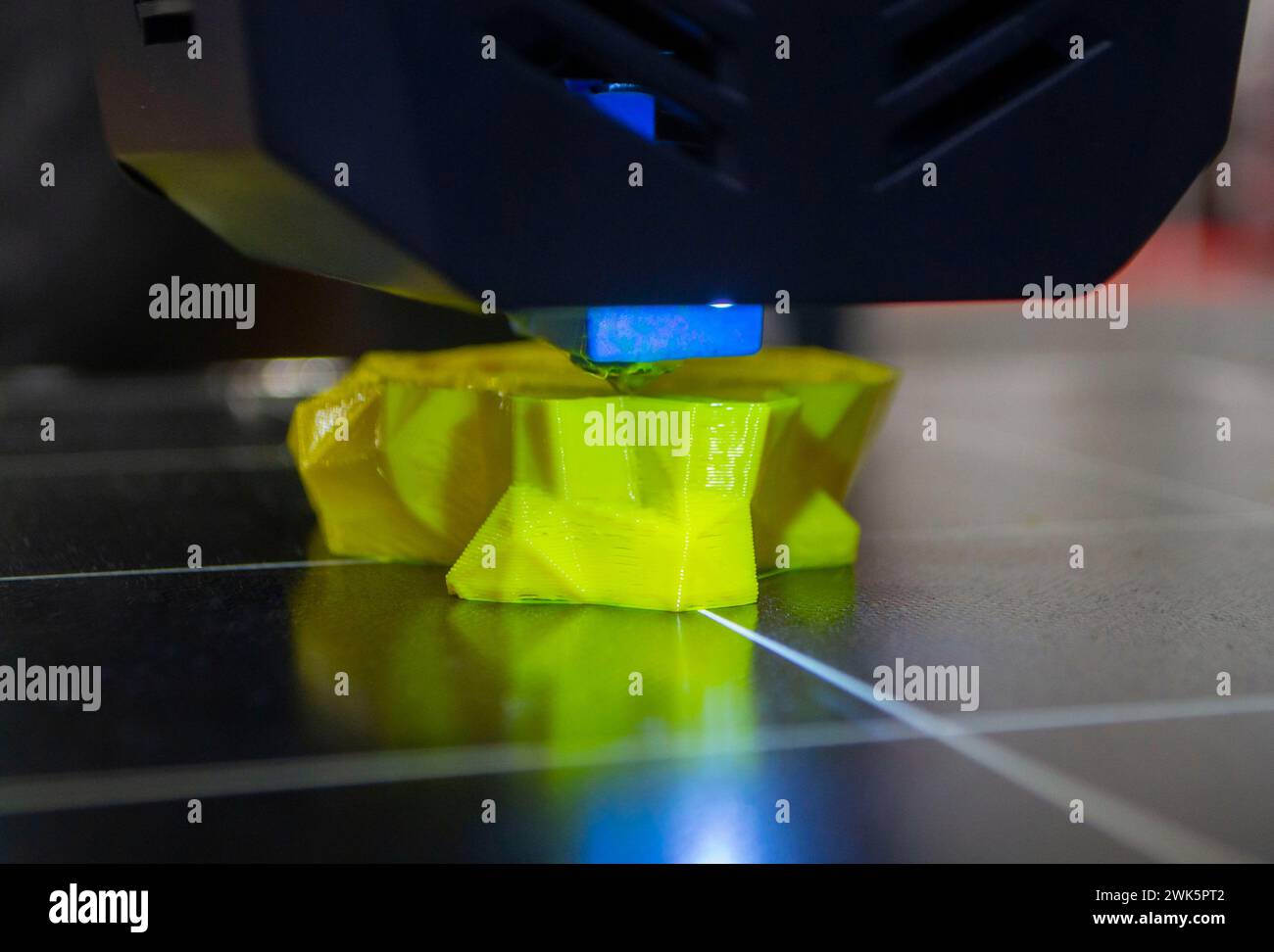 The process of printing an object with 3D printer. 3D printer printing ...