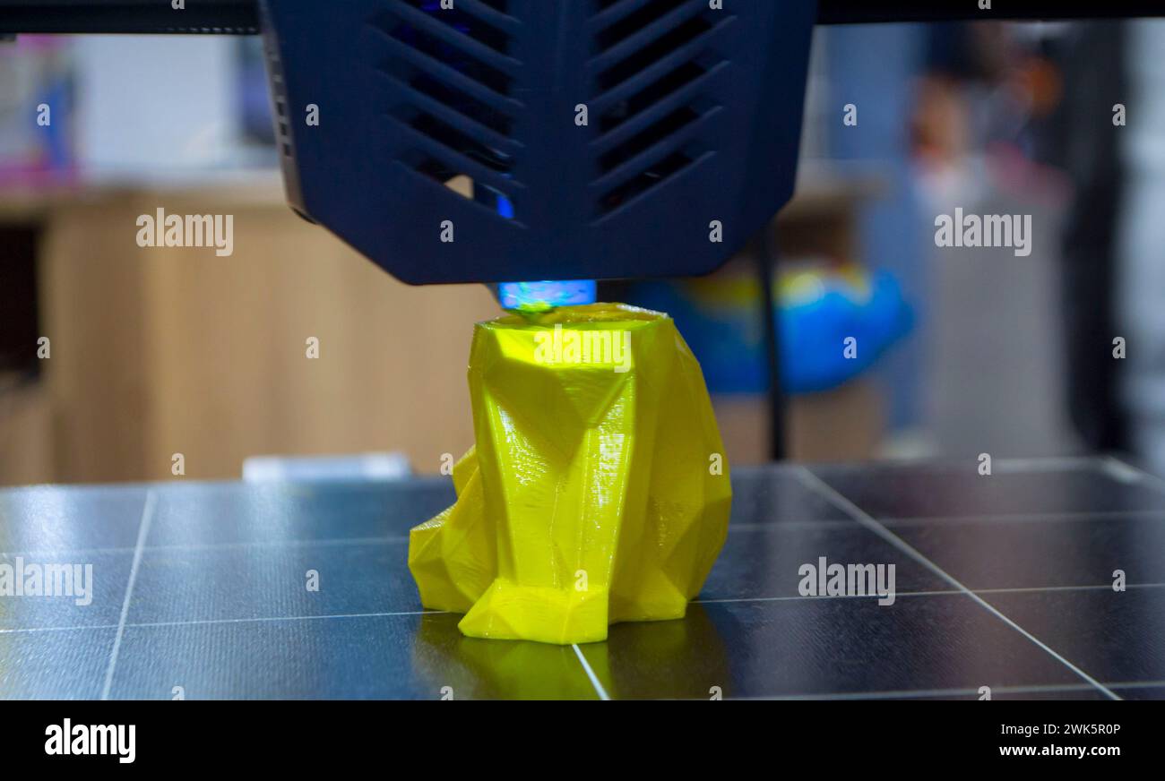 The process of printing an object with 3D printer. 3D printer printing ...