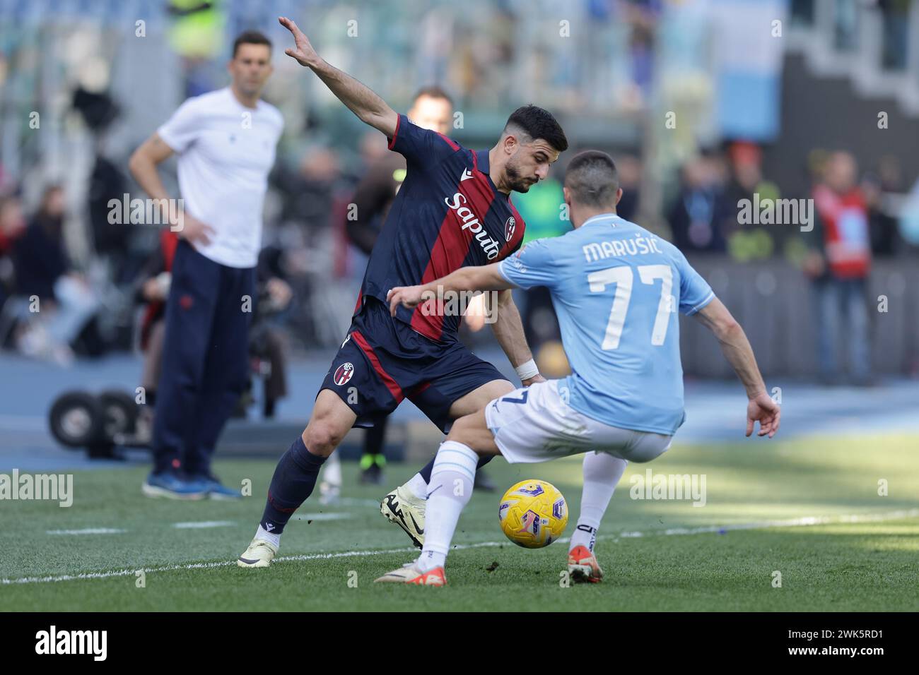 Bologna's Italian forward Riccardo Orsolini challenges for the ball ...
