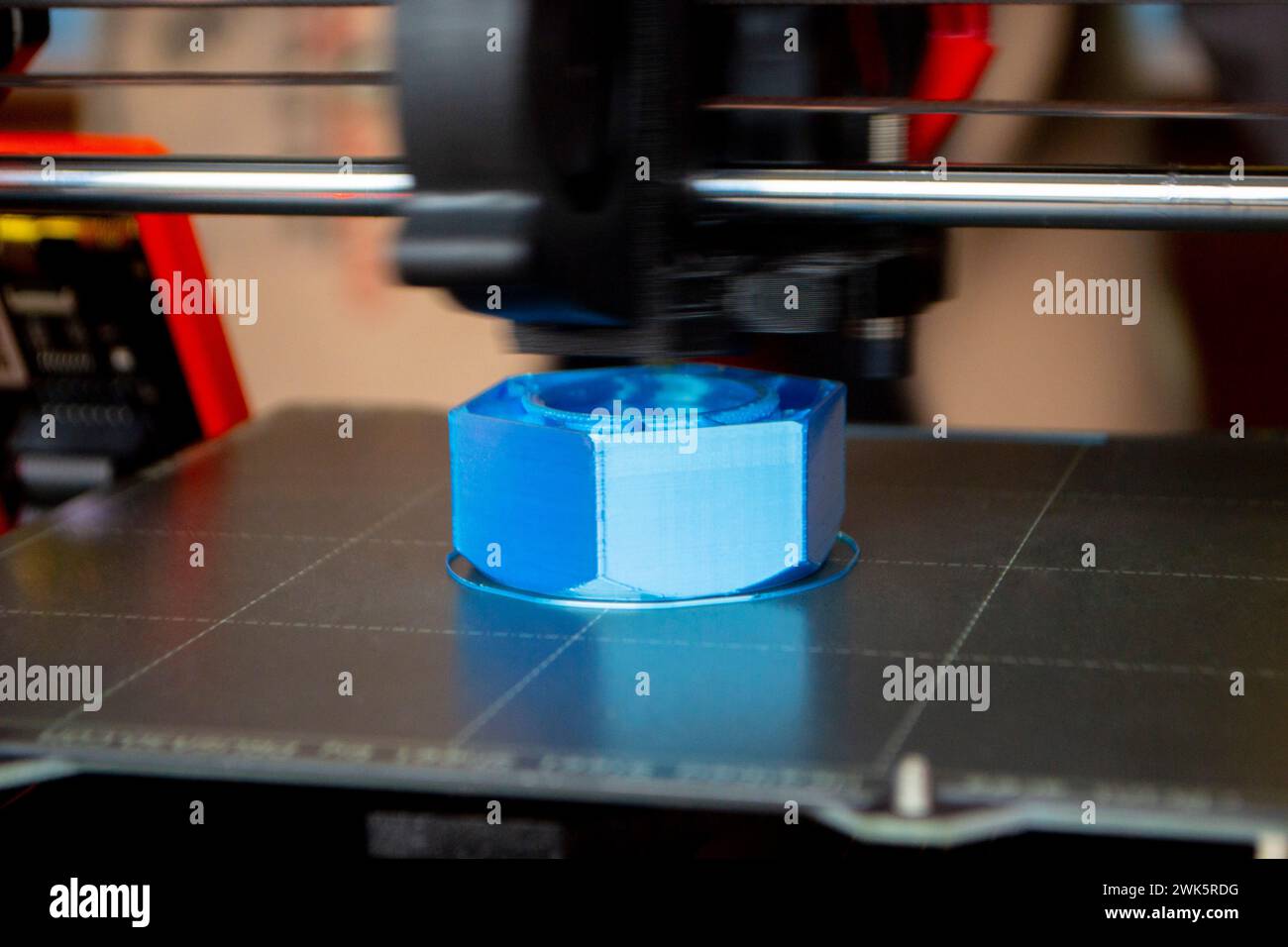 The process of printing an object with 3D printer. 3D printer printing ...