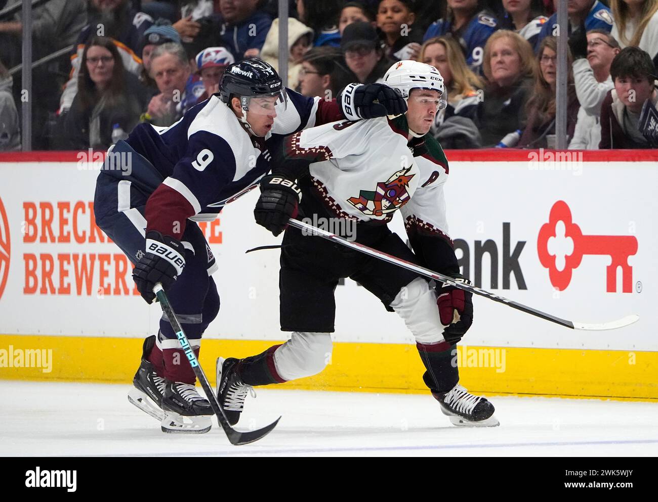 Colorado Avalanche left wing Zach Parise, left, pursues the puck with ...