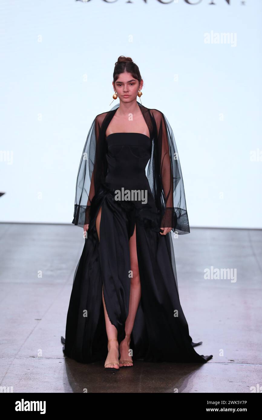 London, UK. 18th Feb, 2024. A model walks the runway during the SUNCUN ...