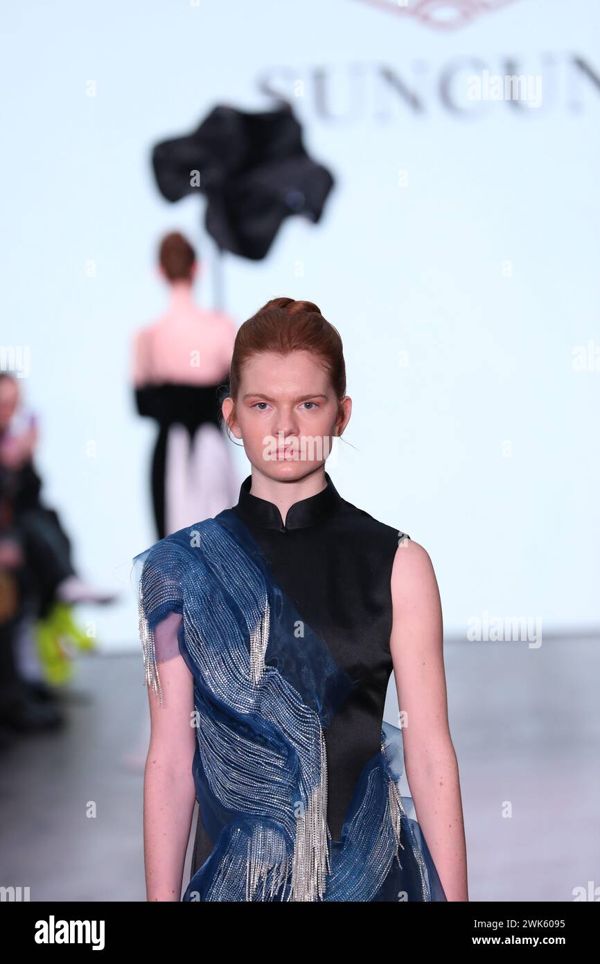 London, UK. 18th Feb, 2024. A model walks the runway during the SUNCUN ...