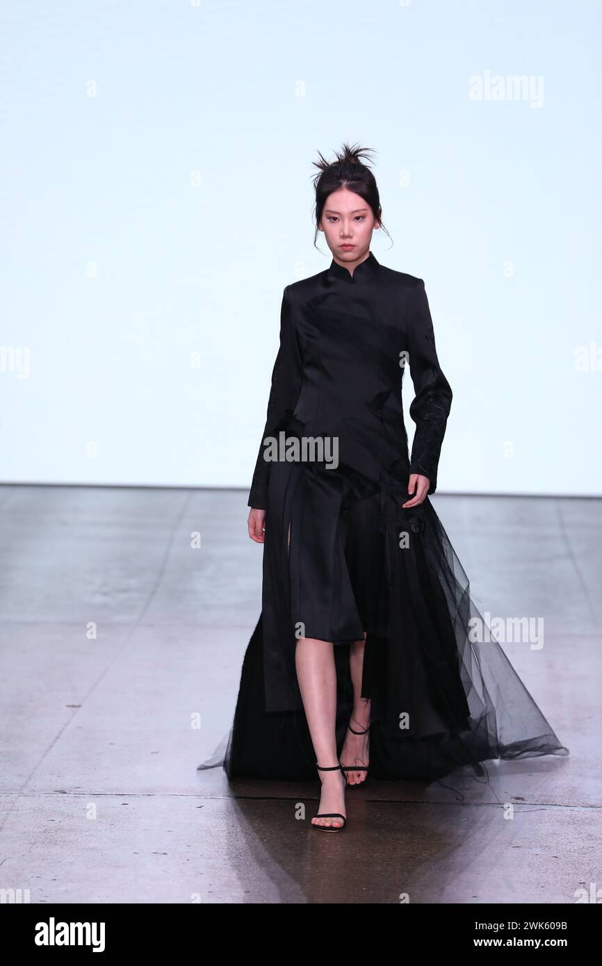 London, UK. 18th Feb, 2024. A model walks the runway during the SUNCUN ...