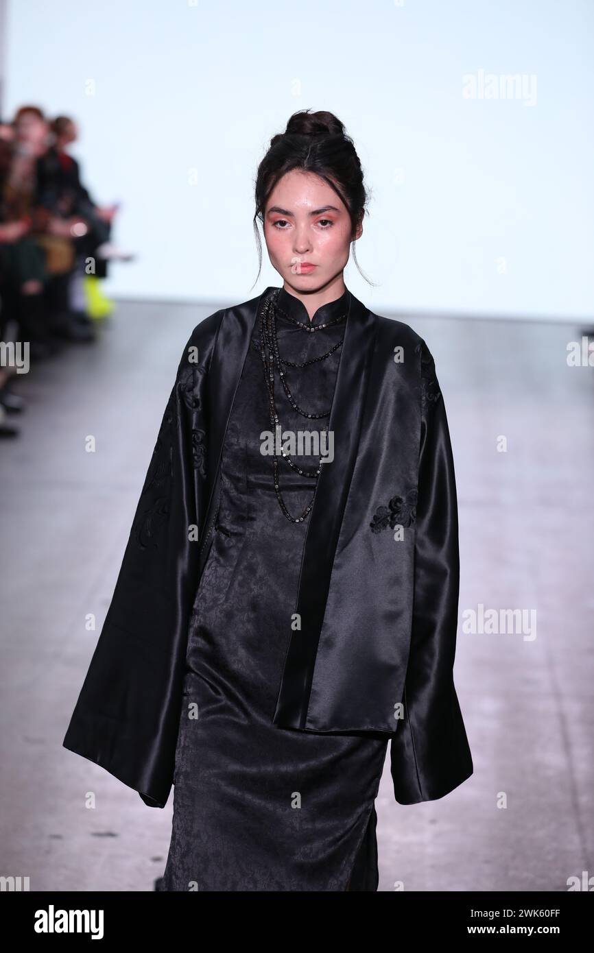 London, UK. 18th Feb, 2024. A model walks the runway during the SUNCUN ...