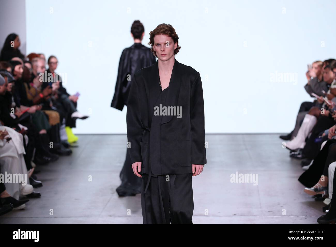 London, UK. 18th Feb, 2024. A model walks the runway during the SUNCUN ...