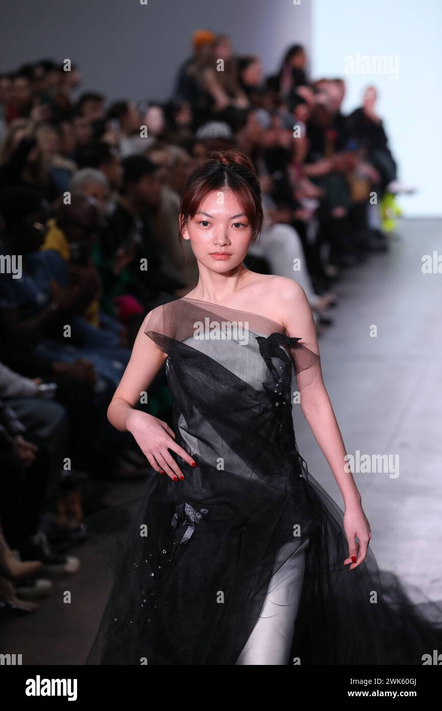 London, UK. 18th Feb, 2024. A model walks the runway during the SUNCUN ...