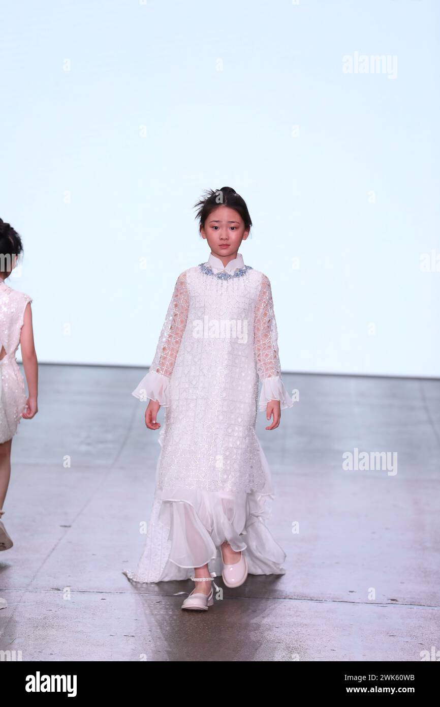 London, UK. 18th Feb, 2024. A model walks the runway during the SUNCUN ...