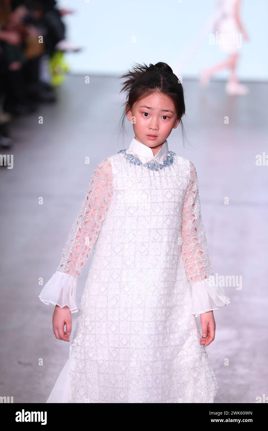 London, UK. 18th Feb, 2024. A model walks the runway during the SUNCUN ...