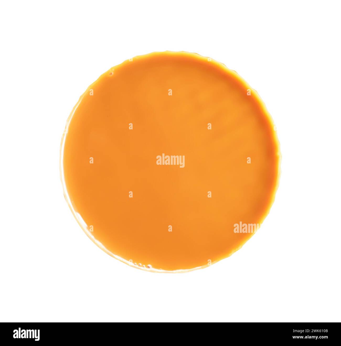 Top view of hot orange or yellow condensed milk tea is isolated on ...
