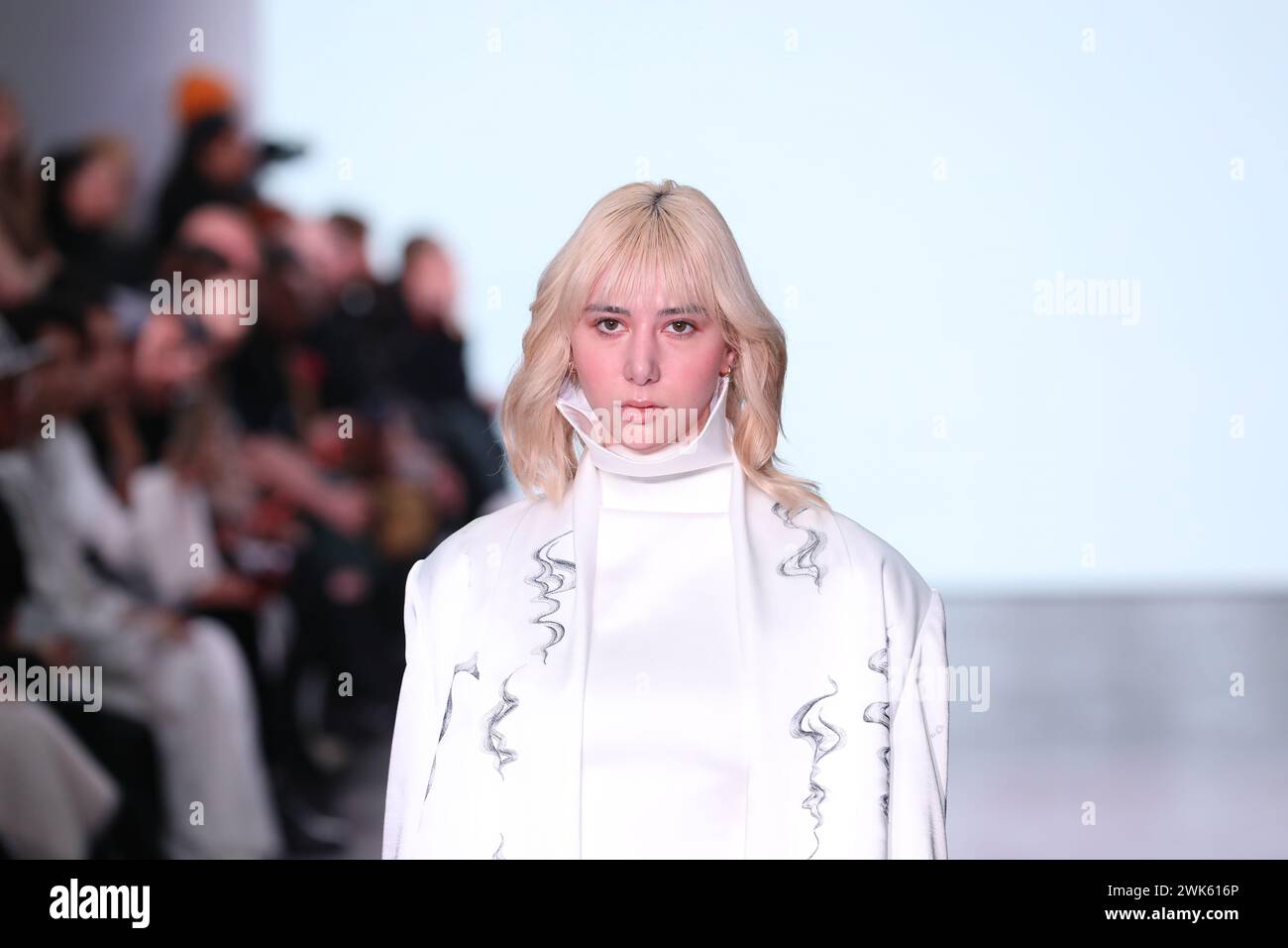 London, UK. 18th Feb, 2024. A model walks the runway during the SUNCUN ...