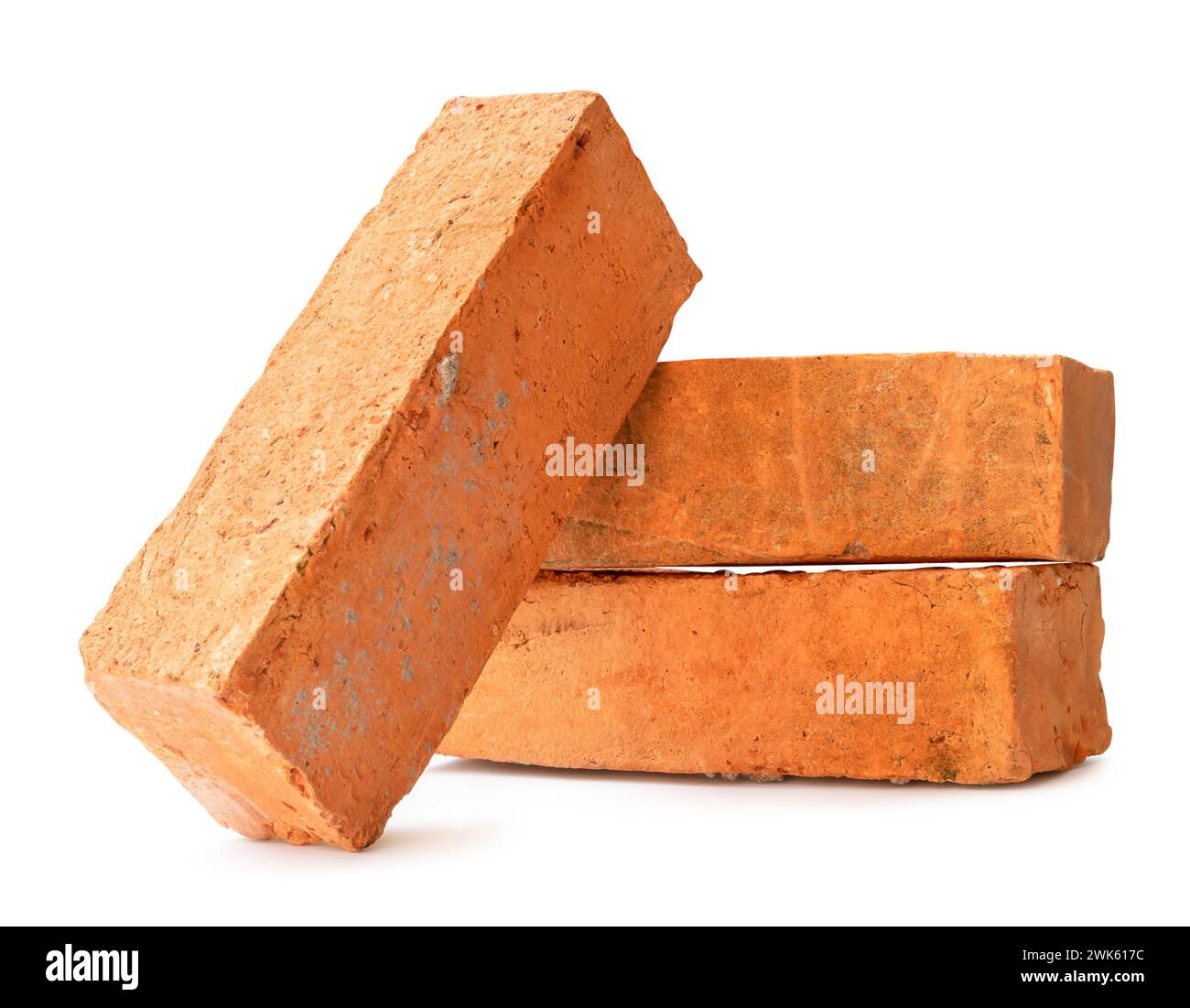 Cracked old red or orange bricks in stack are isolated on white ...