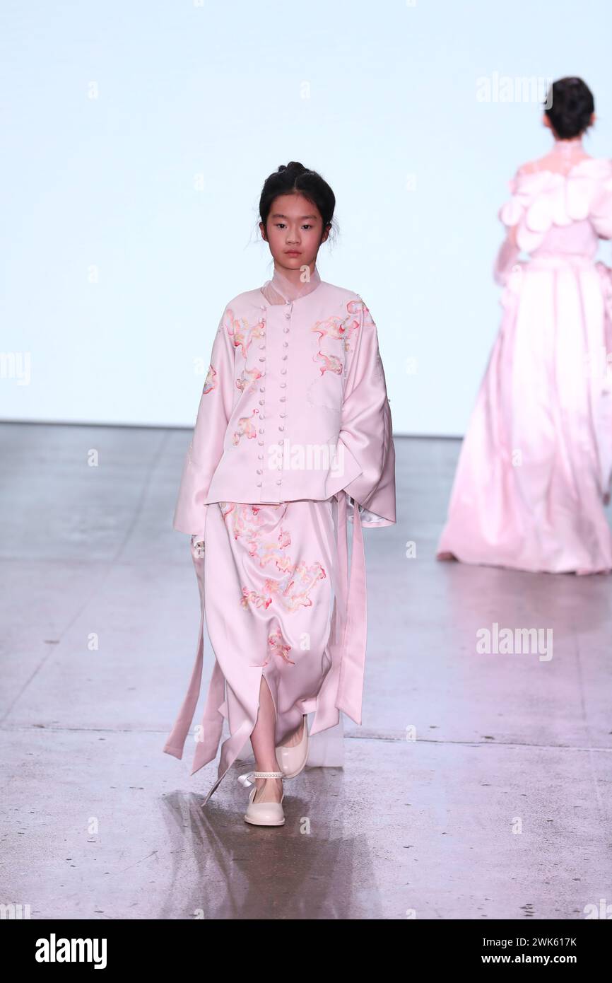 London, UK. 18th Feb, 2024. A model walks the runway during the SUNCUN ...