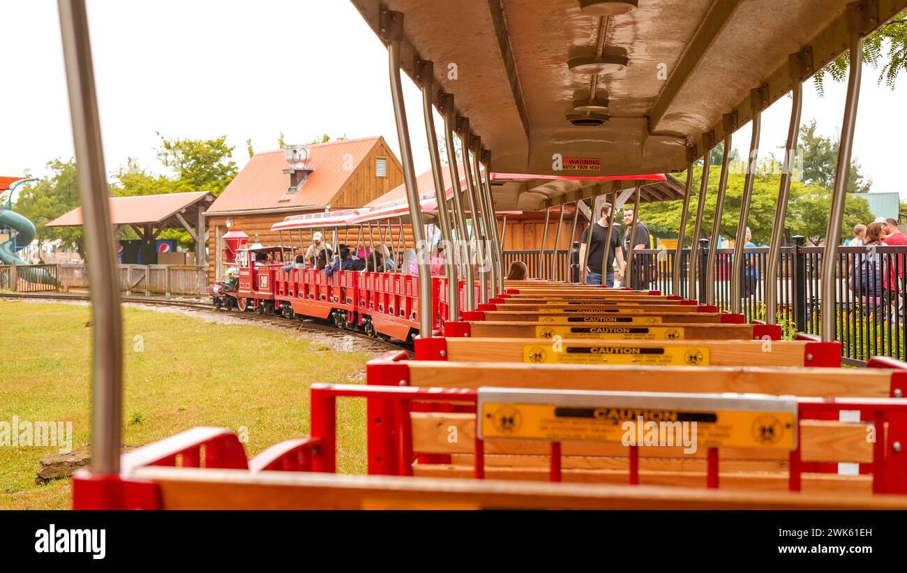 Steam locomotive and narrow gauge railroad at the Safari park on a ...