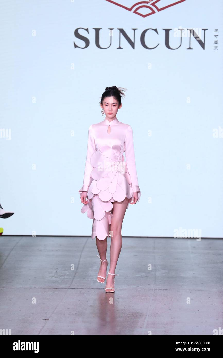 London, UK. 18th Feb, 2024. A model walks the runway during the SUNCUN ...