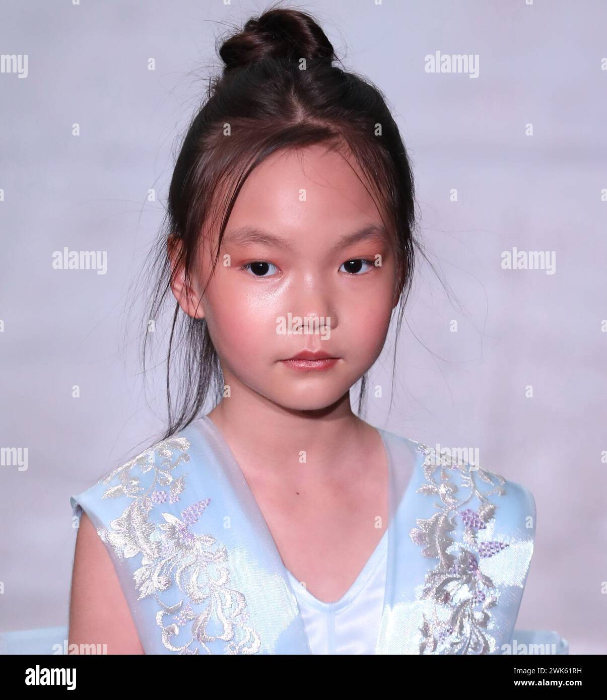 London, UK. 18th Feb, 2024. A model walks the runway during the SUNCUN ...