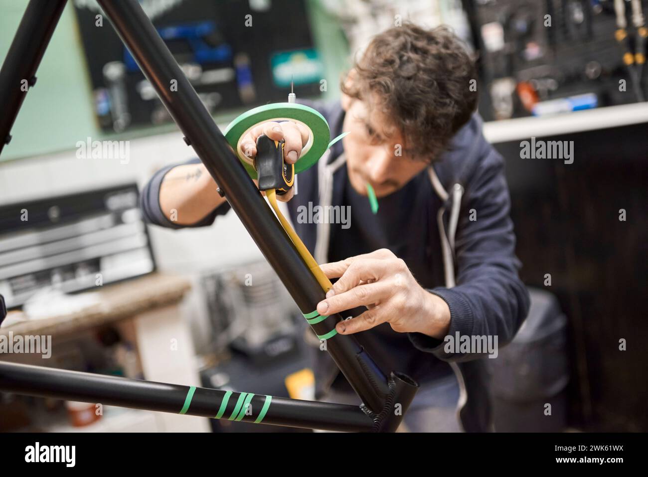 Man taking measurements with a tape measure, process of preparing a ...