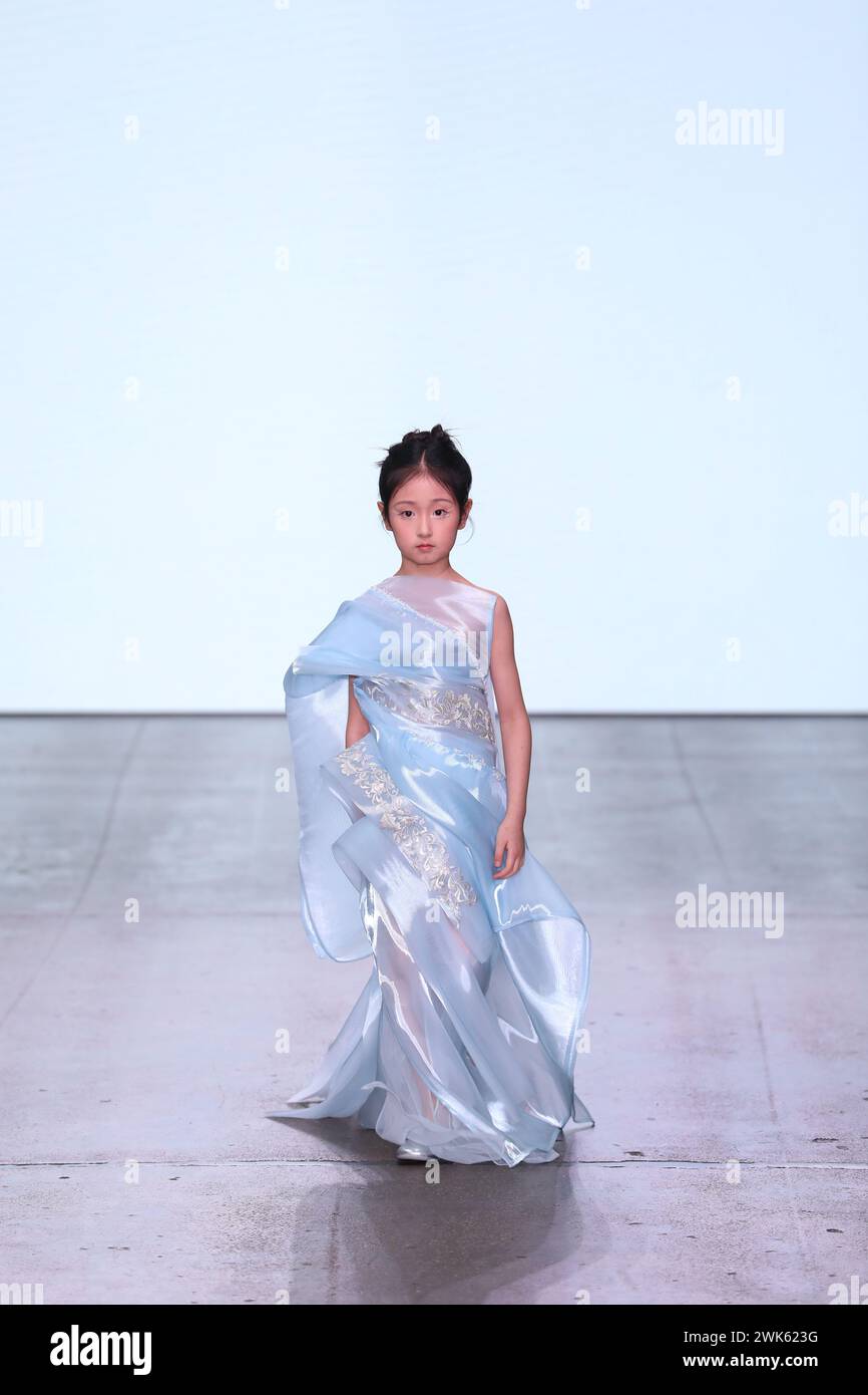 London, UK. 18th Feb, 2024. A model walks the runway during the SUNCUN ...