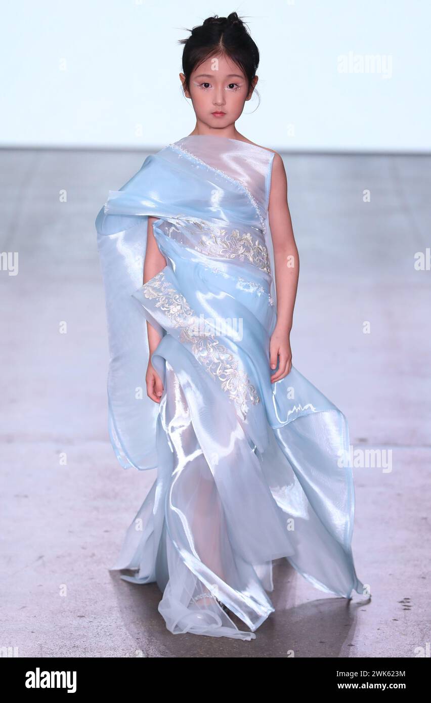 London, UK. 18th Feb, 2024. A model walks the runway during the SUNCUN ...