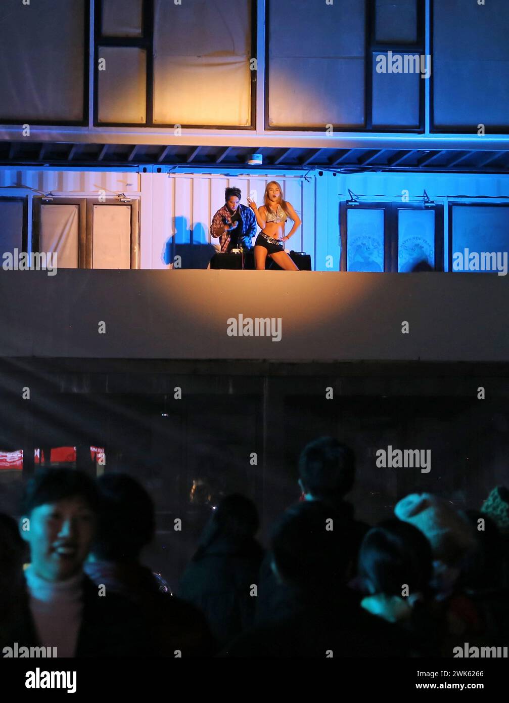 SHANGHAI, CHINA - FEBRUARY 12, 2024 - Visitors dance with a 3D light ...