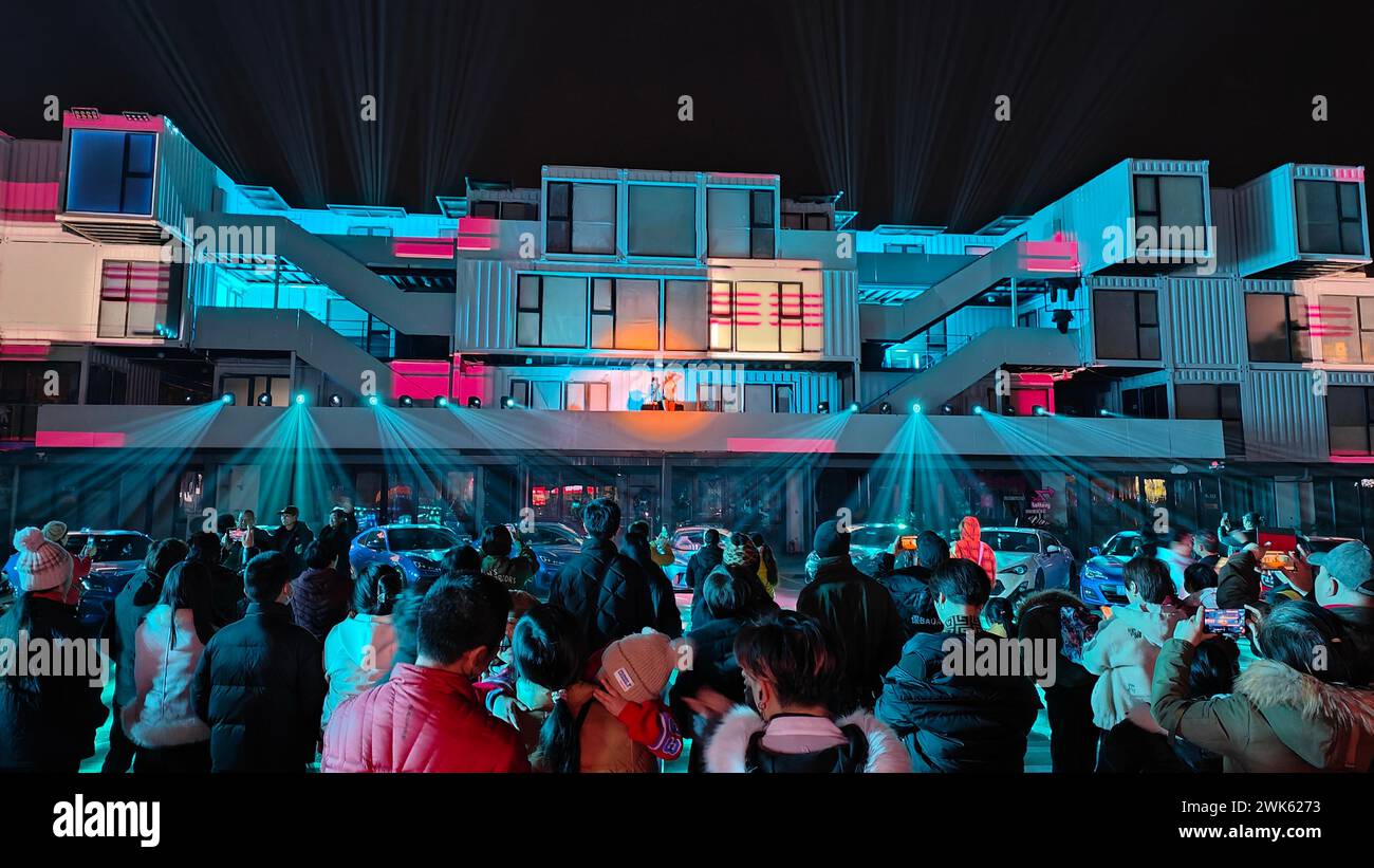 SHANGHAI, CHINA - FEBRUARY 12, 2024 - Visitors dance with a 3D light ...
