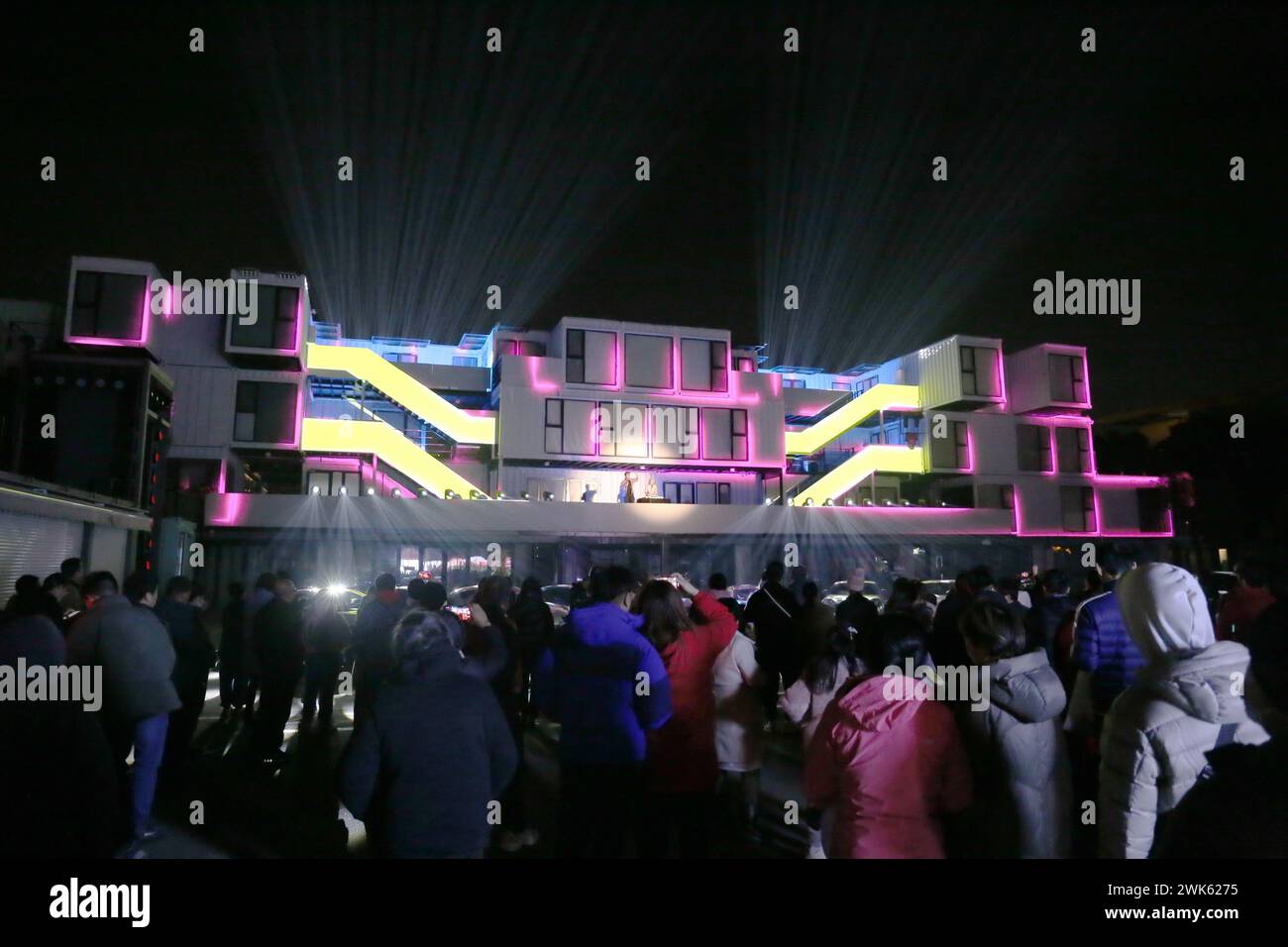 SHANGHAI, CHINA - FEBRUARY 12, 2024 - Visitors dance with a 3D light ...