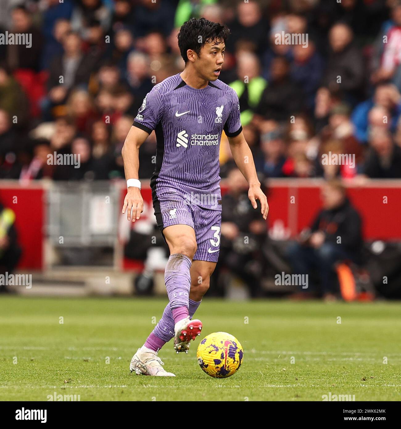 Liverpool's Wataru Endo in action before the Premier League match ...