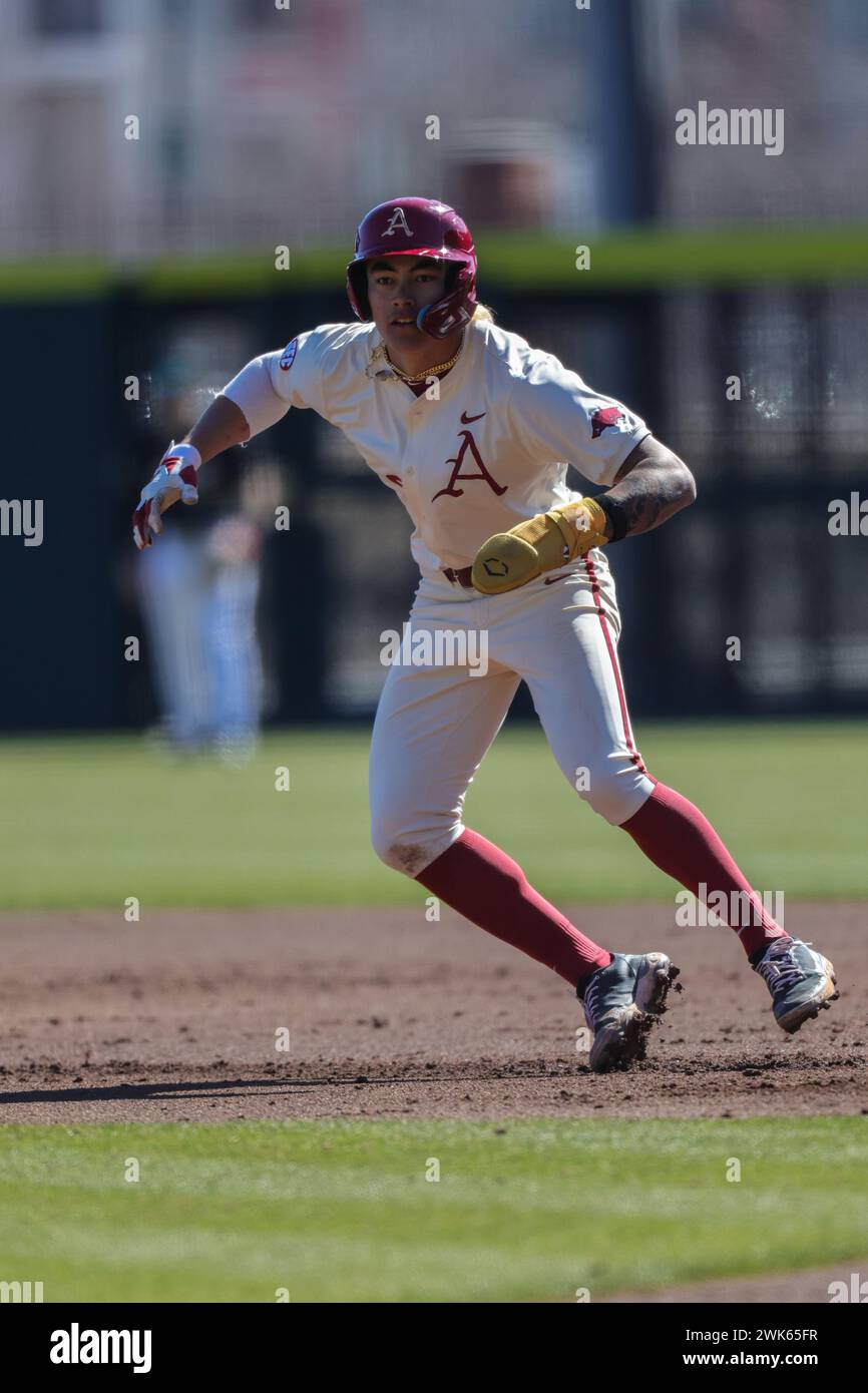 February 18, 2024: Arkansas infielder Wehiwa Aloy #9 works to increase ...