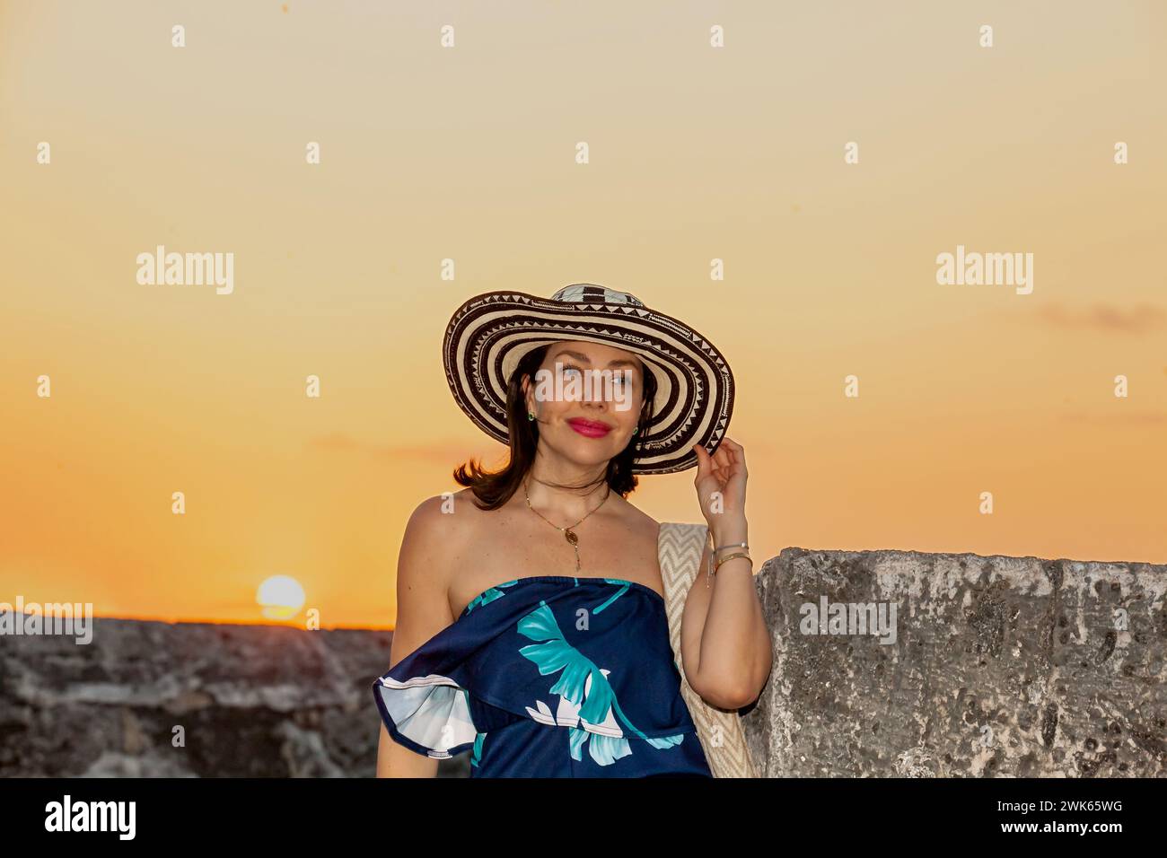 Beautiful woman wearing the traditional Colombian hat called Sombrero ...