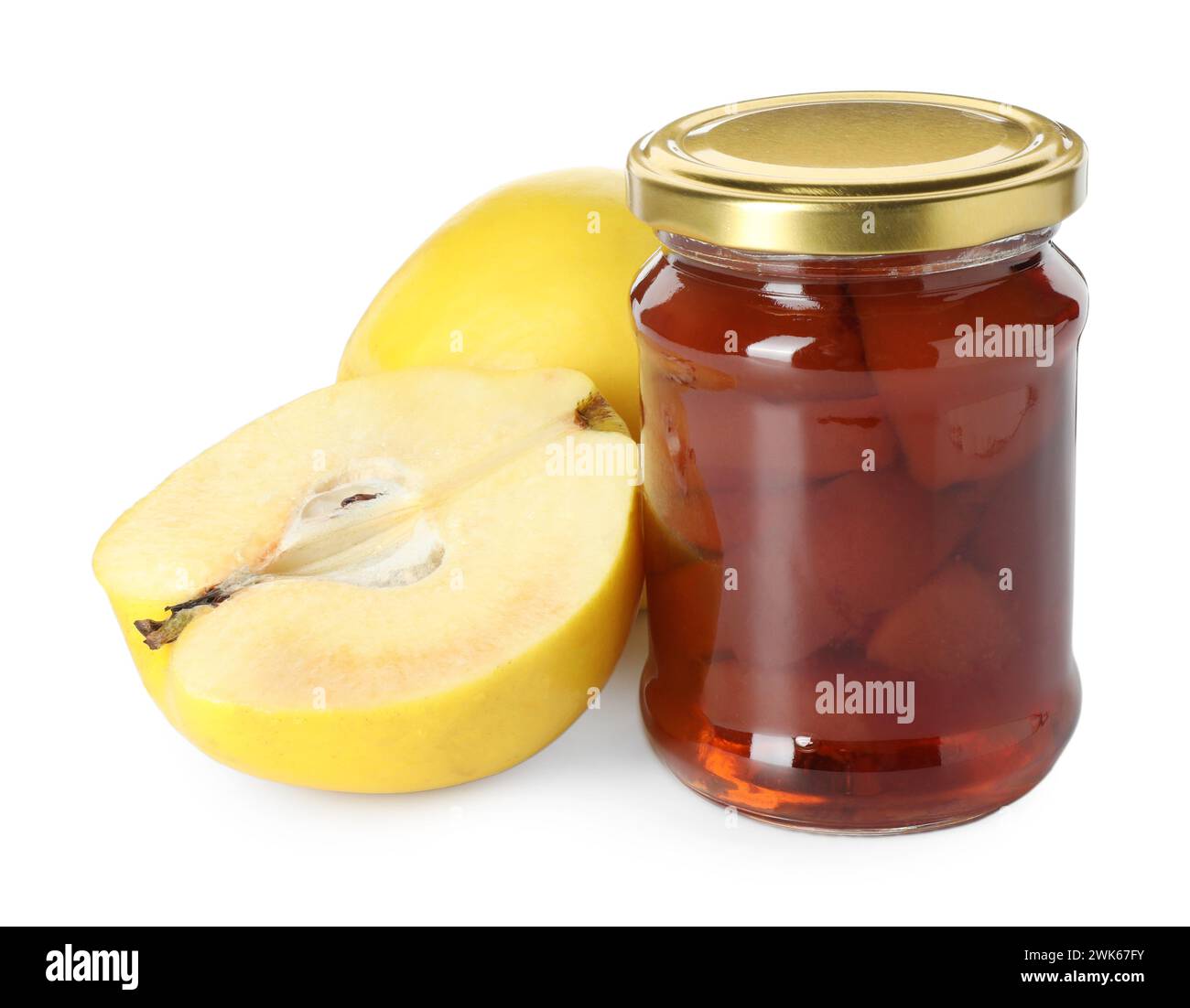 Tasty homemade quince jam in jar and fruits isolated on white Stock ...